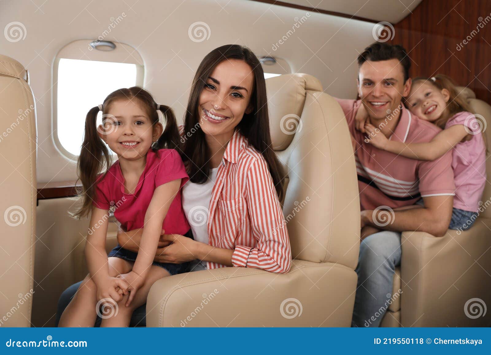 Happy Family Together in Airplane during Flight Stock Photo - Image of ...