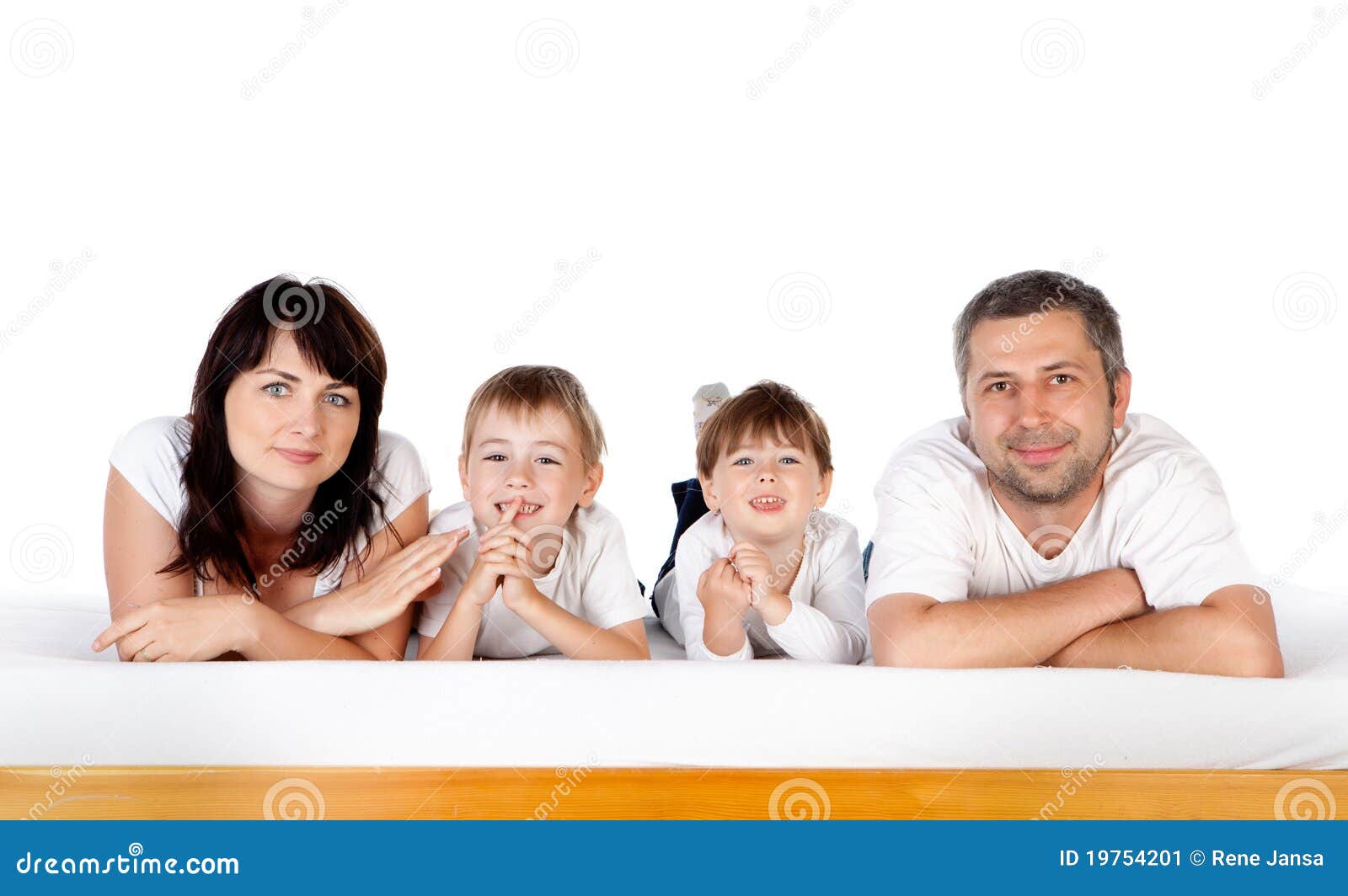 Happy Family Together on Bed Stock Image - Image of male, love: 19754201
