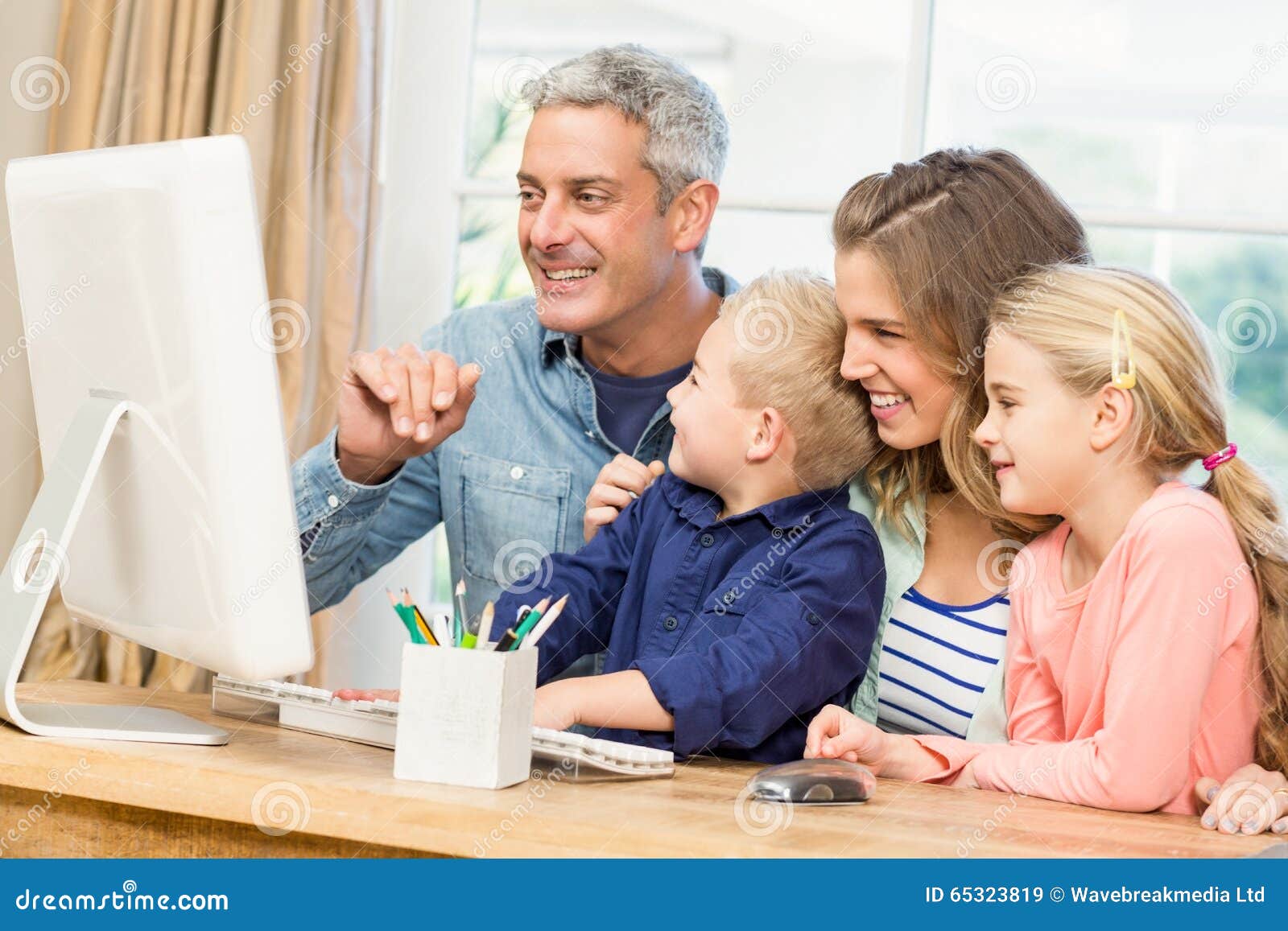 Happy Family Using the Computer Stock Image - Image of curtains ...
