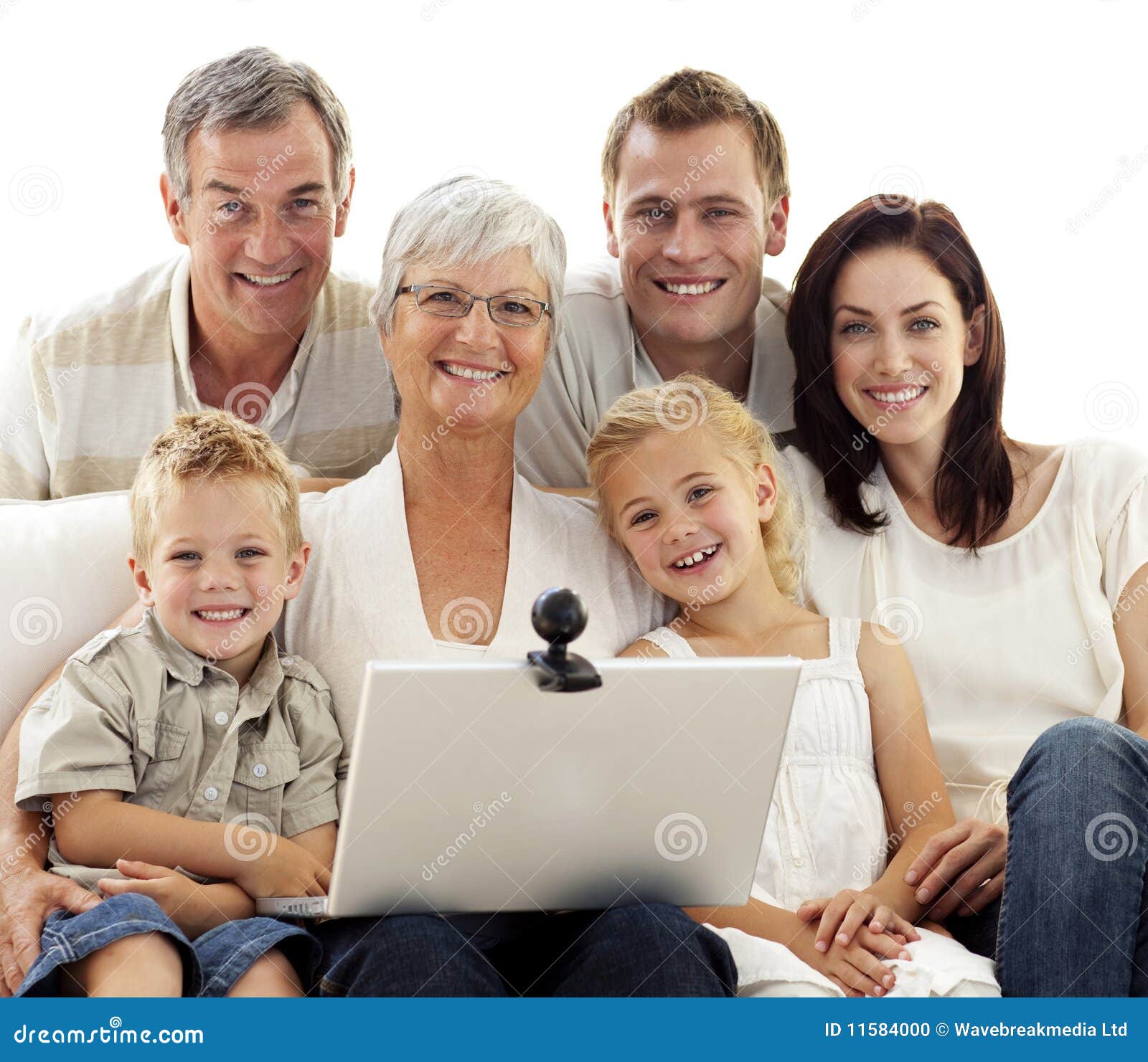 Happy Family Using a Laptop at Home Stock Photo - Image of brown ...