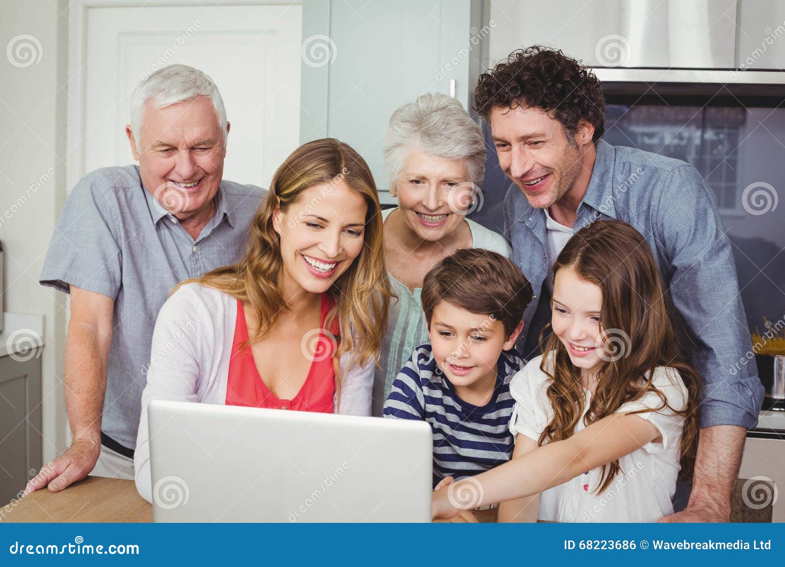 Happy Family Using Laptop in Kitchen Stock Photo - Image of daughter ...