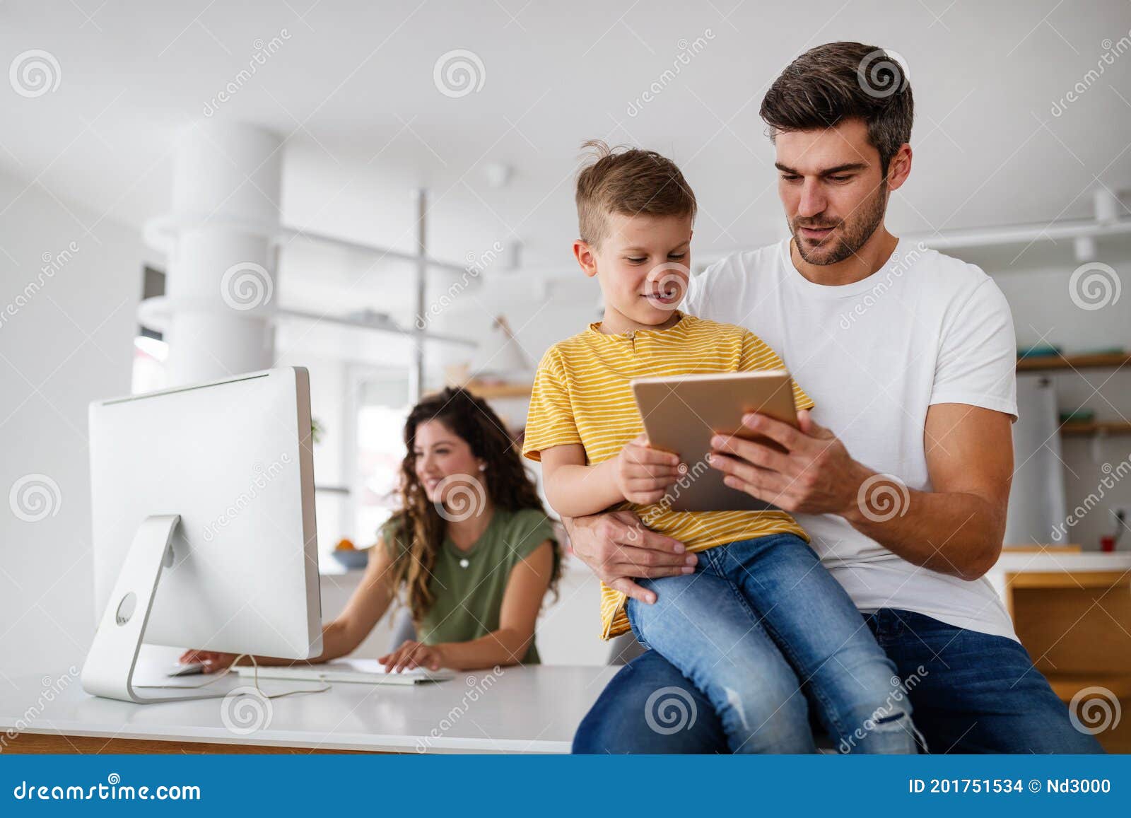 Happy Family Using Technology Devices Together at Home. Stock Photo ...
