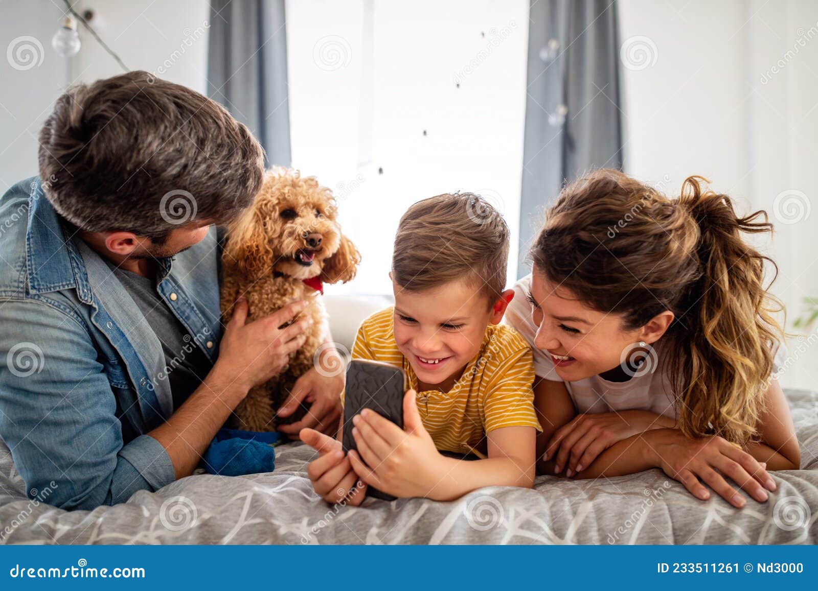 Happy Family Using Technology Devices Together at Home. Stock Image ...