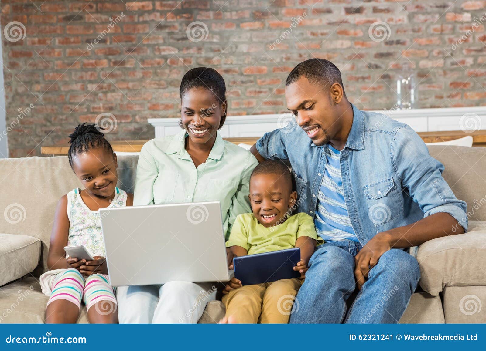 Happy Family Using Technology Together Stock Image - Image of couch ...