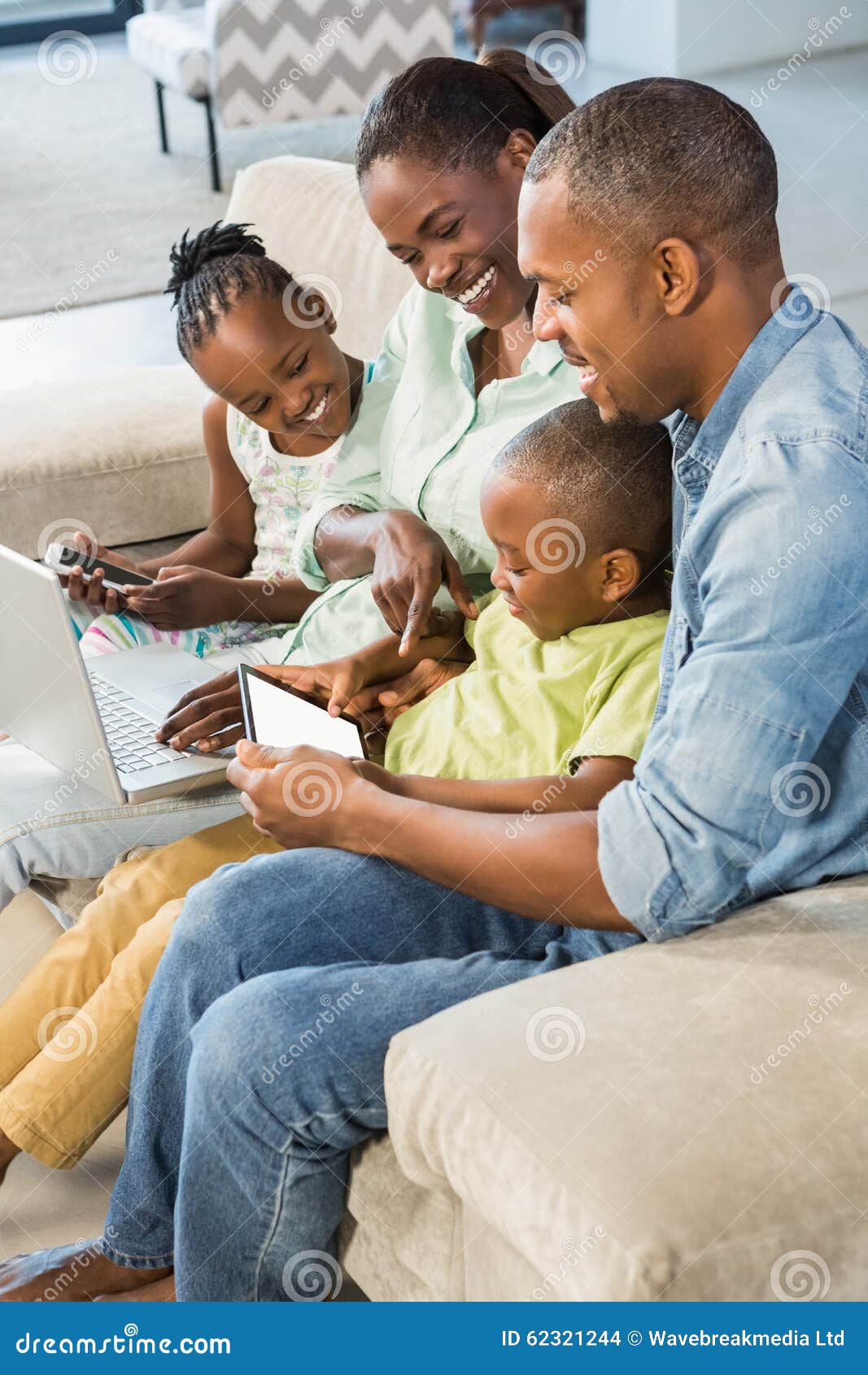 Happy Family Using Technology Together Stock Photo - Image of male ...
