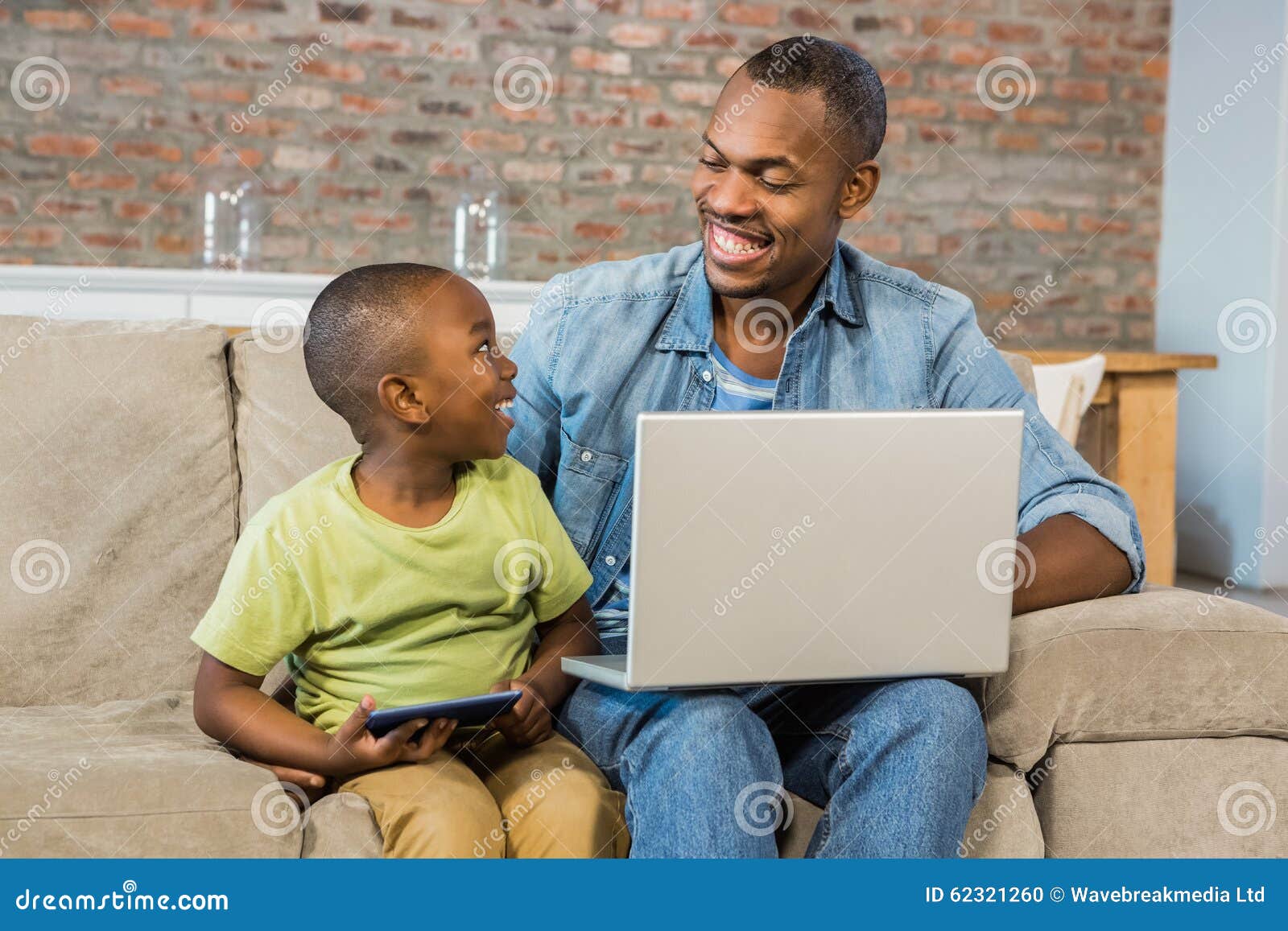 Happy Family Using Technology Together Stock Photo - Image of father ...