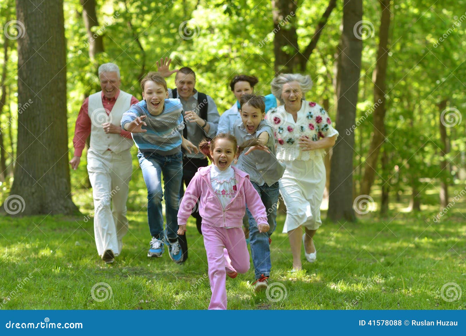 Happy family walking stock photo. Image of girl, green - 41578088