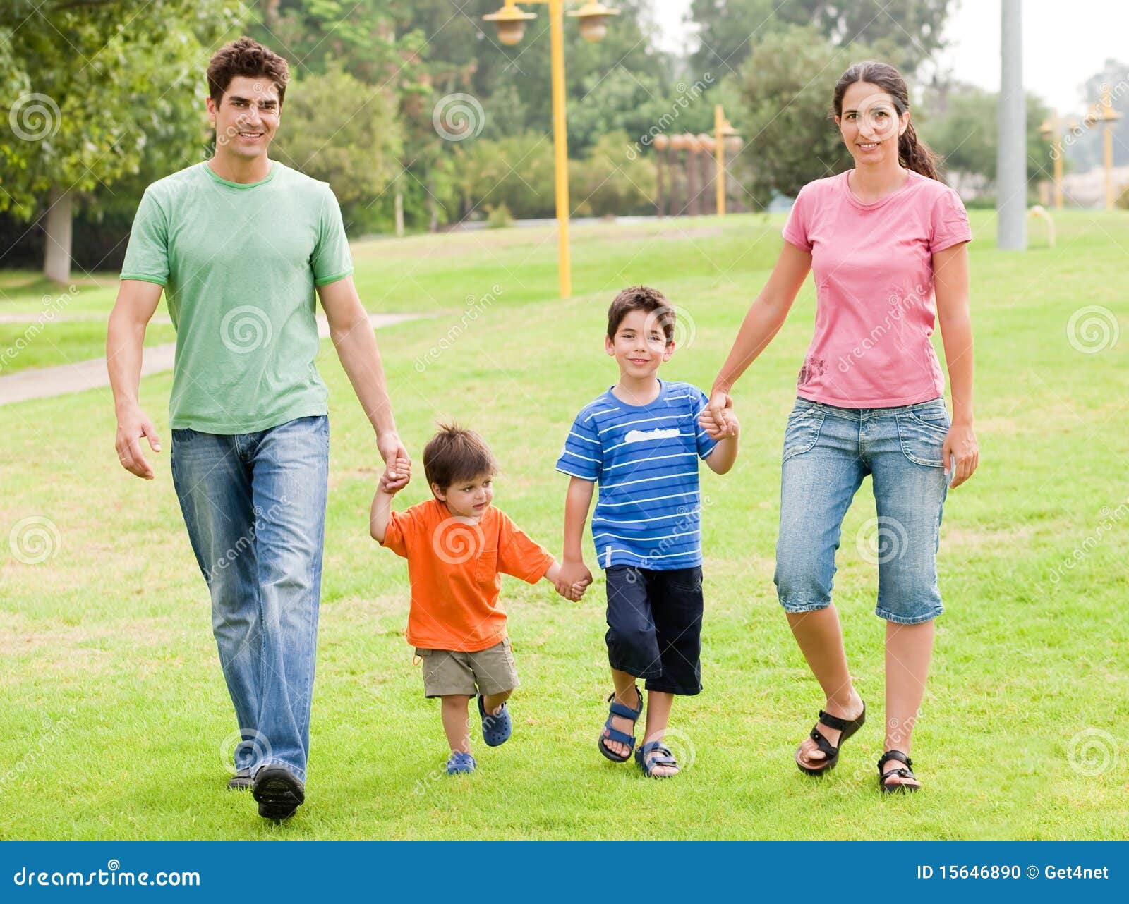 Happy Family Walking In The Park Stock Photo - Image: 15646890 Happy Family Walking In The Park Stock Photo - Image: 15646890