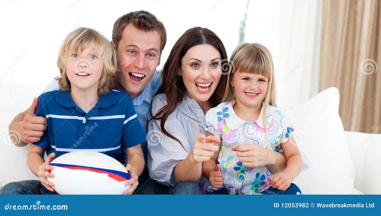 Happy Family Watching a Rugby Match Stock Photo - Image of people ...