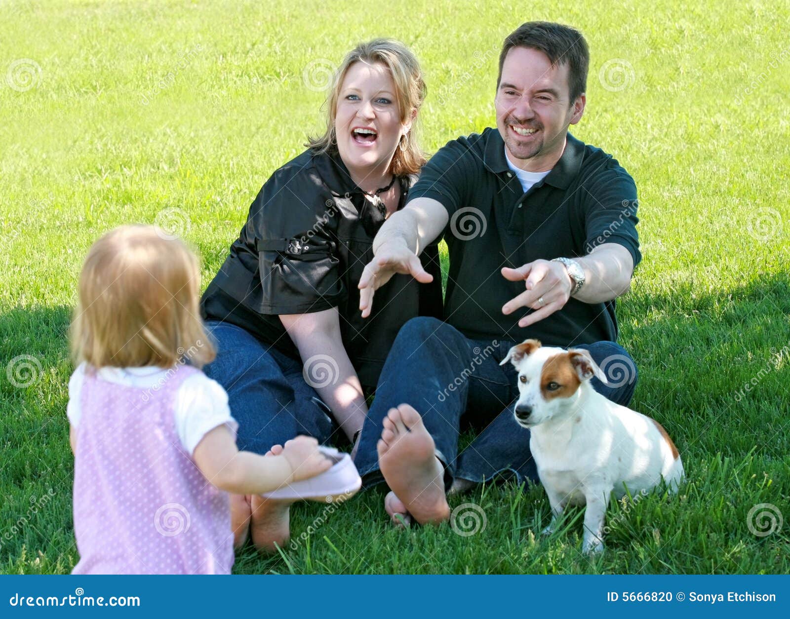 Happy Family in Yard stock photo. Image of couple, casual - 5666820