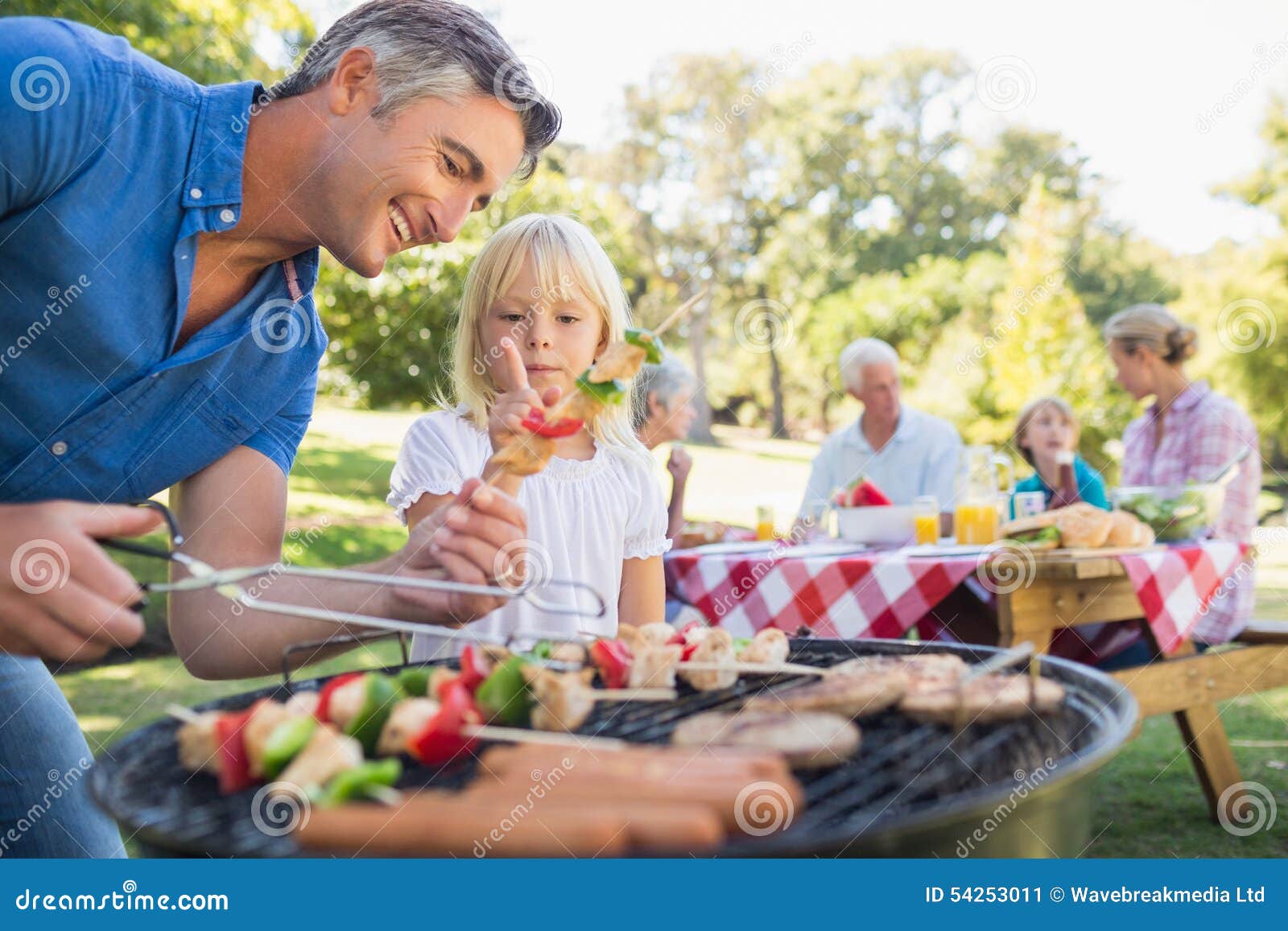 Happy Father Doing Barbecue with Her Daughter Stock Image - Image of ...