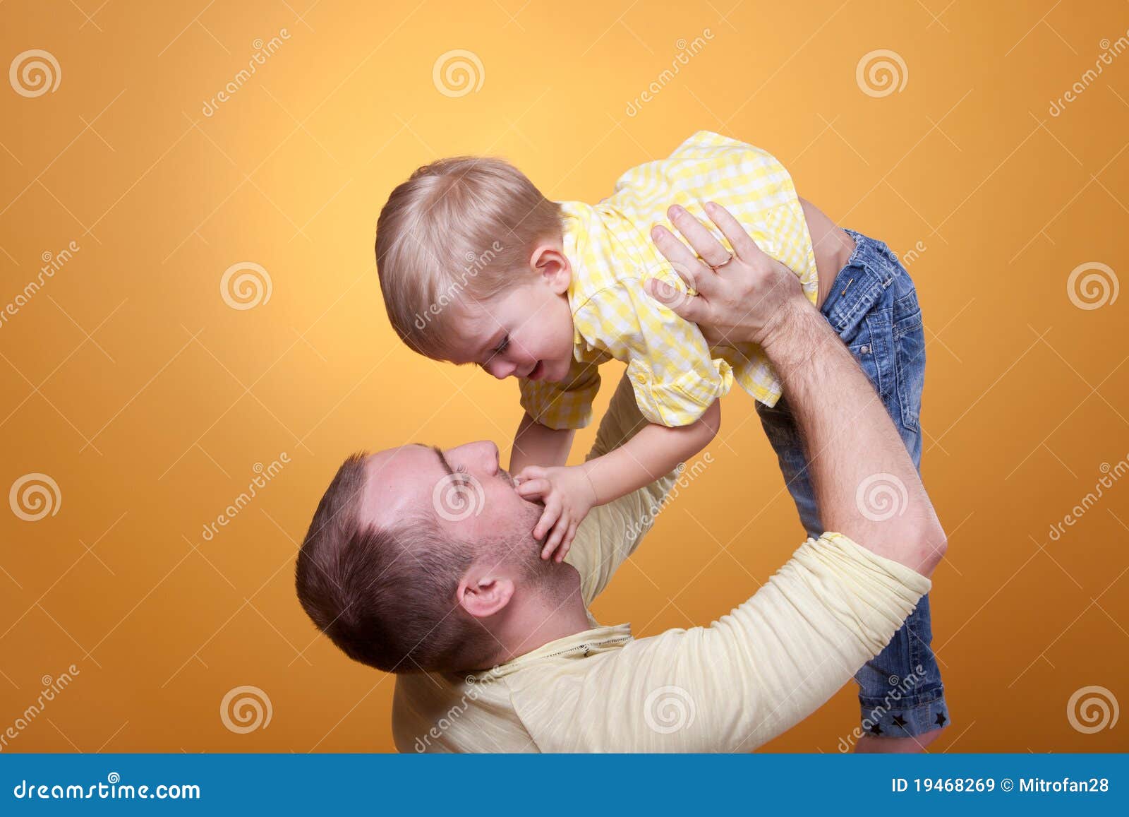 Happy father play with son stock image. Image of holding - 19468269