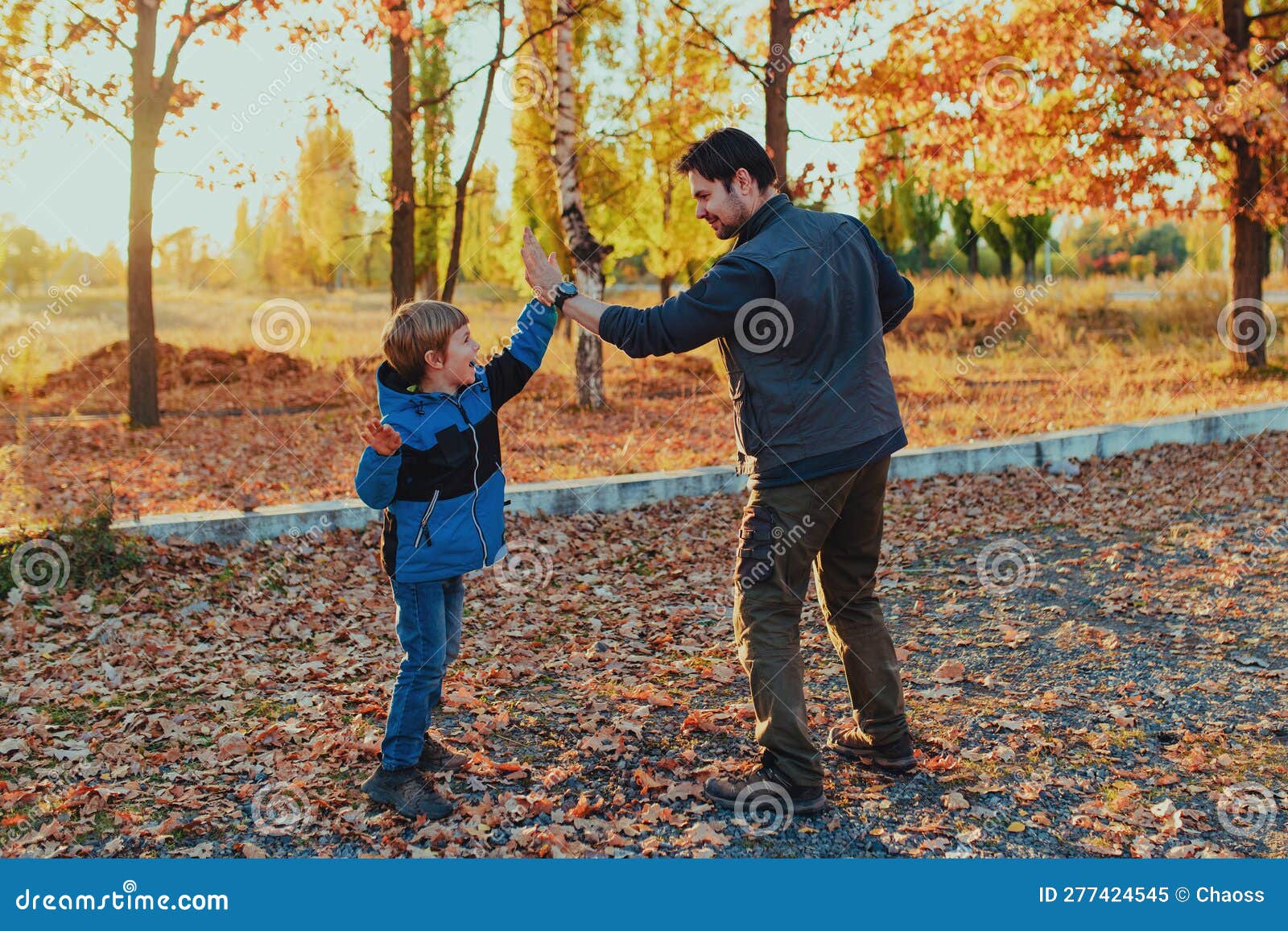 Happy Father and Son Rejoice in Their Success Stock Image - Image of ...