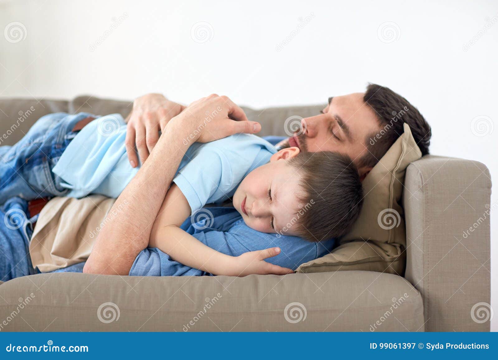 Happy Father And Son Sleeping On Sofa At Home Stock Image Image Of