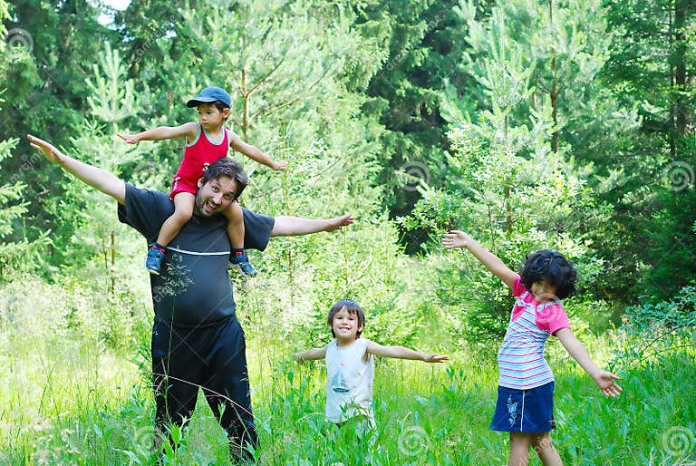 Happy Father and Three Children Stock Image - Image of daughter, people ...