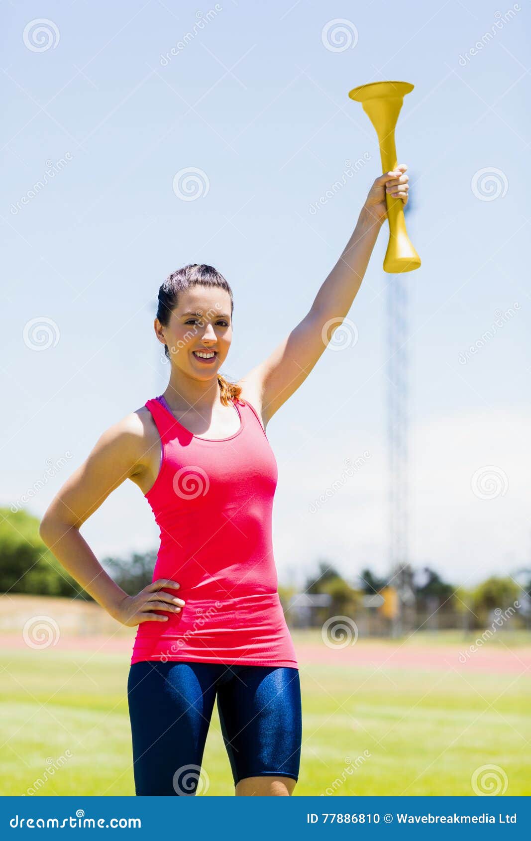 Happy Female Athlete Holding a Fire Torch Stock Photo - Image of ... Happy Female Athlete Holding a Fire Torch Stock Photo - Image of ...