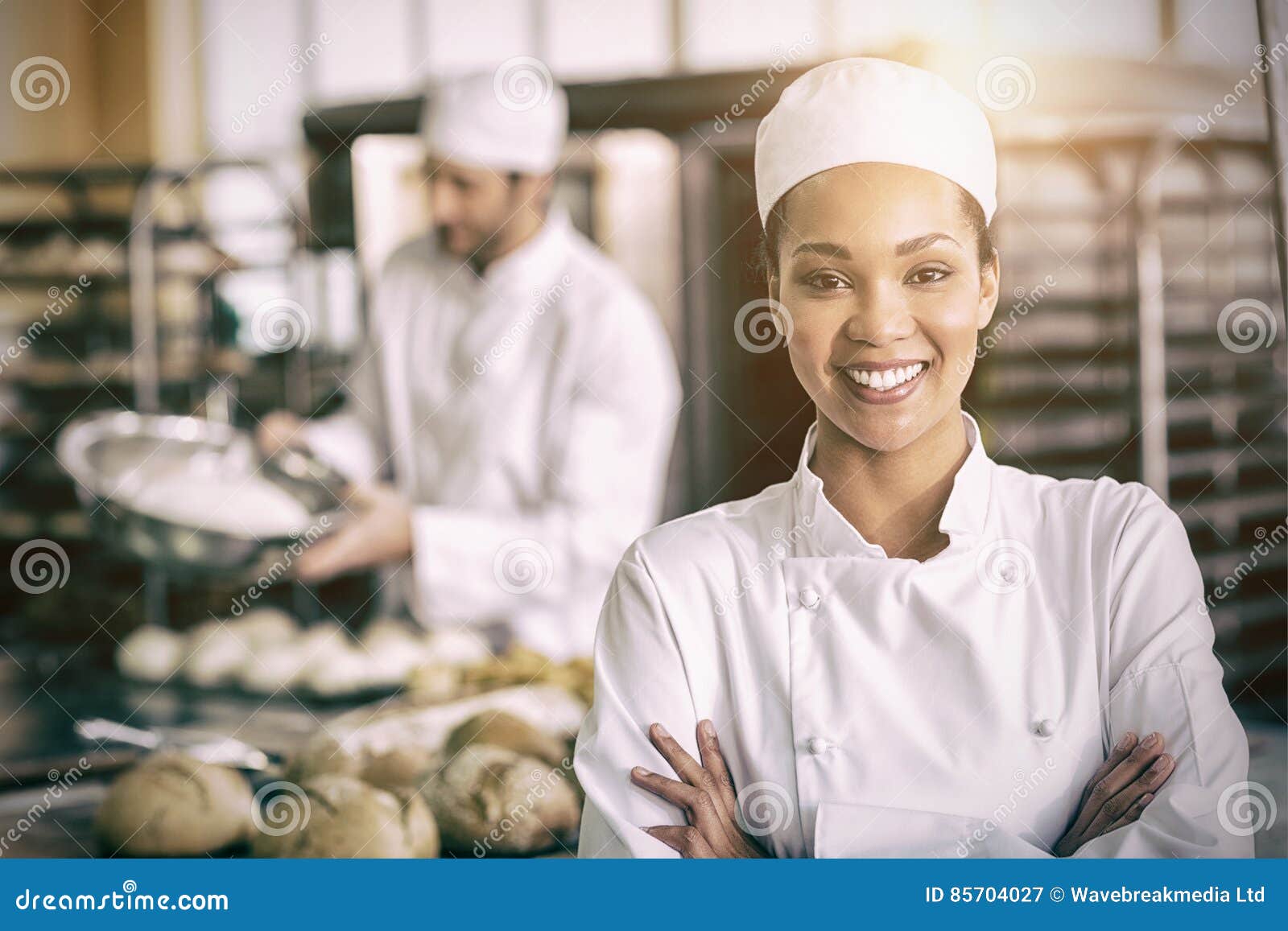 Happy Female Baker Smiling at Camera Stock Image - Image of arms, chefs ...