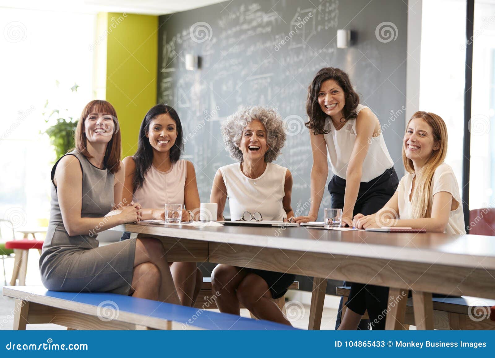 Happy Female Colleagues at a Work Meeting Smiling To Camera Stock Image ... Happy Female Colleagues at a Work Meeting Smiling To Camera Stock Image ...