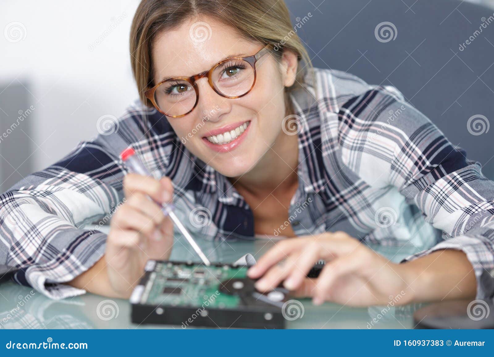 Happy Female Engineer Fixing Broken Computer Hard Drive Stock Image ...