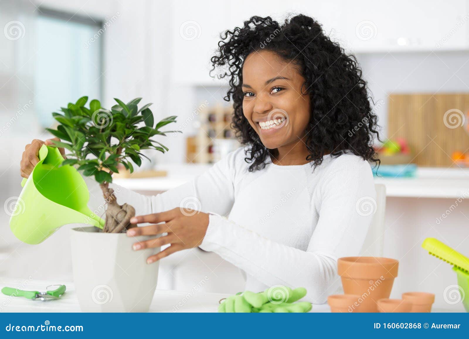 Happy Female Gardener Working from Home Stock Photo - Image of plants ...