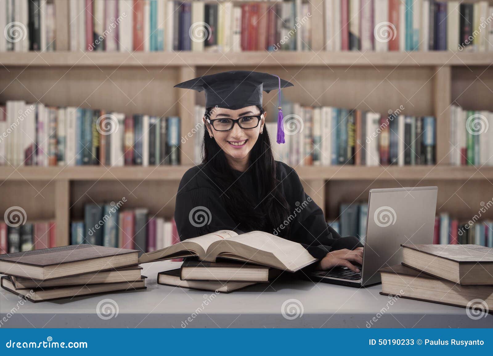 Happy Female Graduate Study at Library with Laptop Stock Image - Image ...