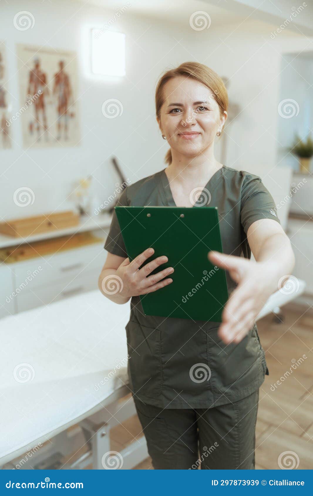 Happy Female Medical Massage Therapist In Massage Cabinet Stock Image Image Of Modern