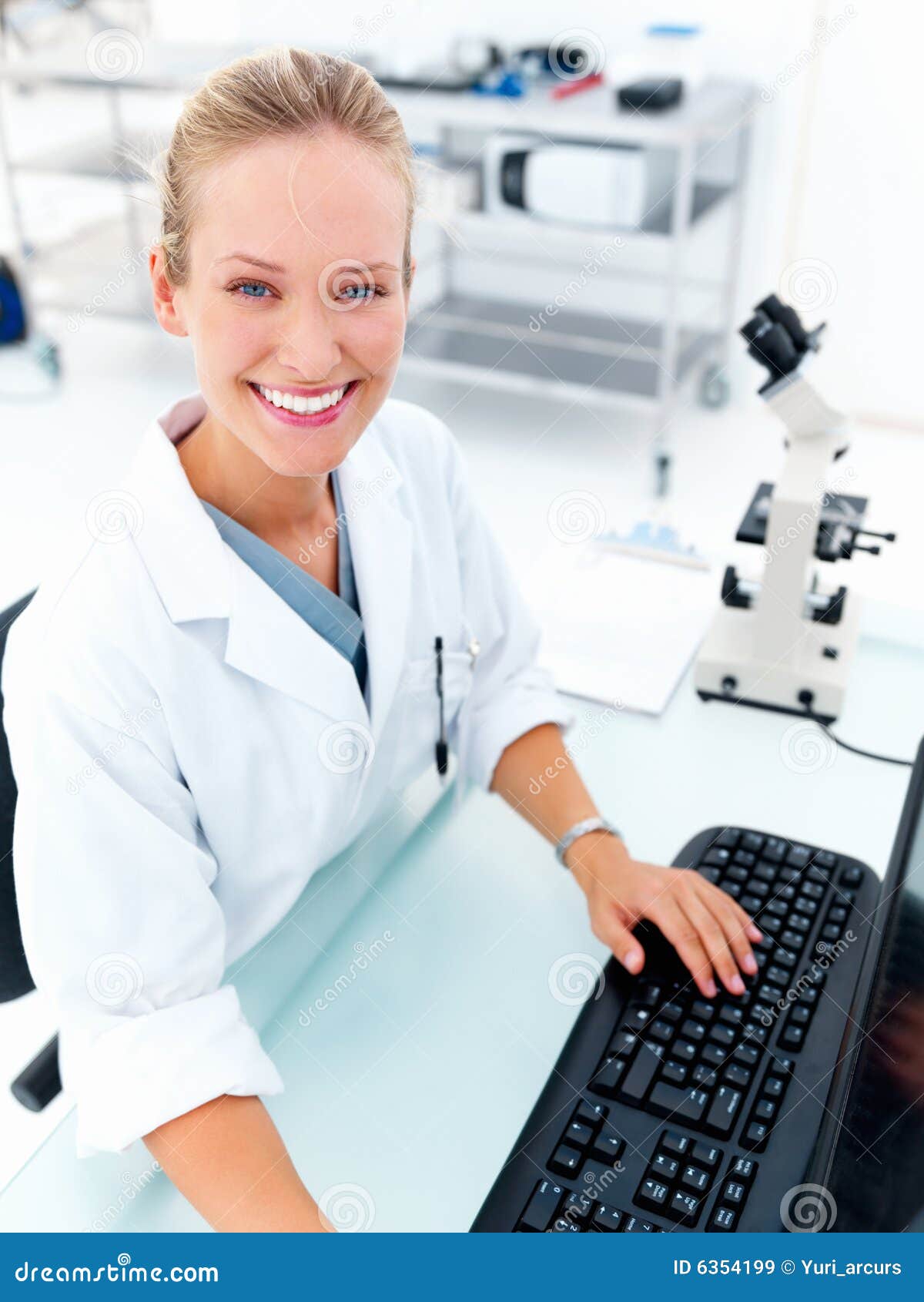 Happy Female Researcher Sitting at a Laboratory Stock Image - Image of ...