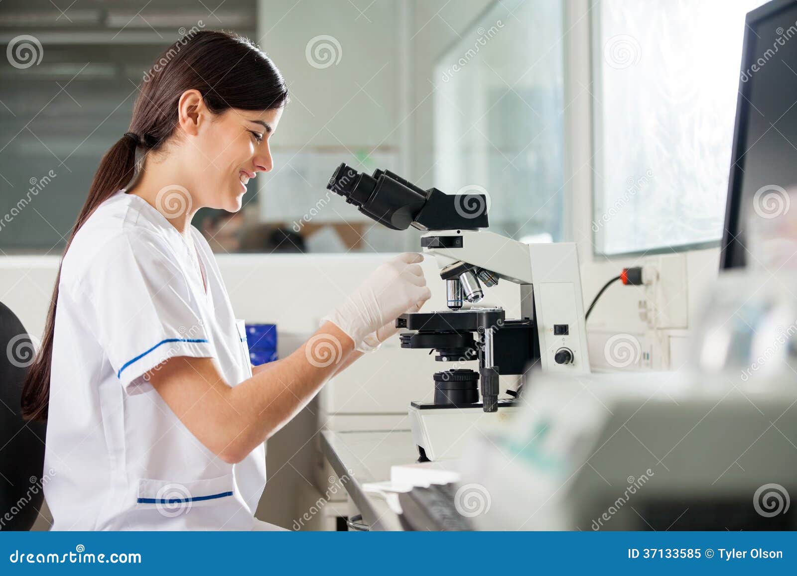 Happy Female Scientist Using Microscope in Lab Stock Image - Image of ...