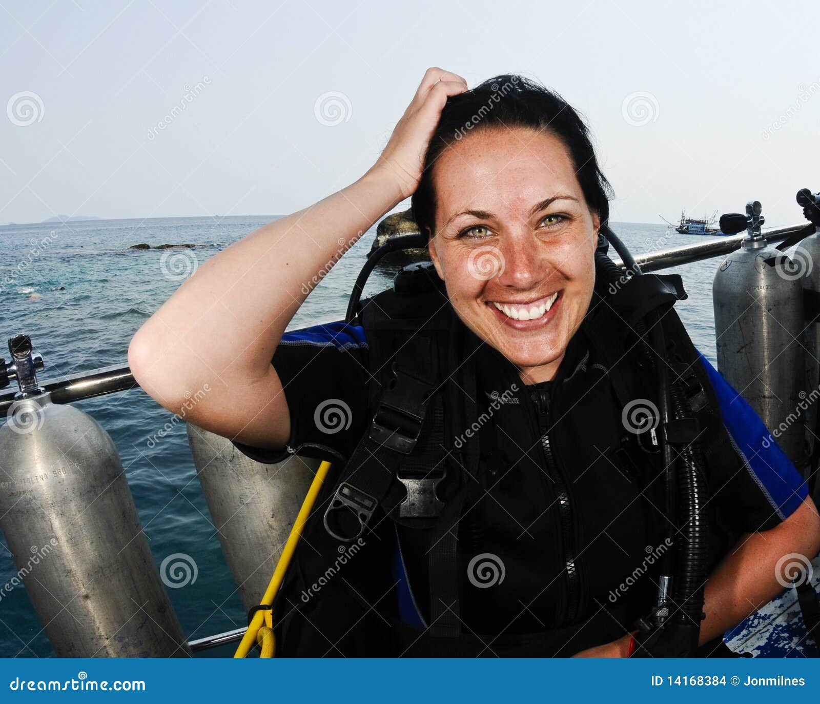 Happy female scuba diver stock photo. Image of tropical - 14168384