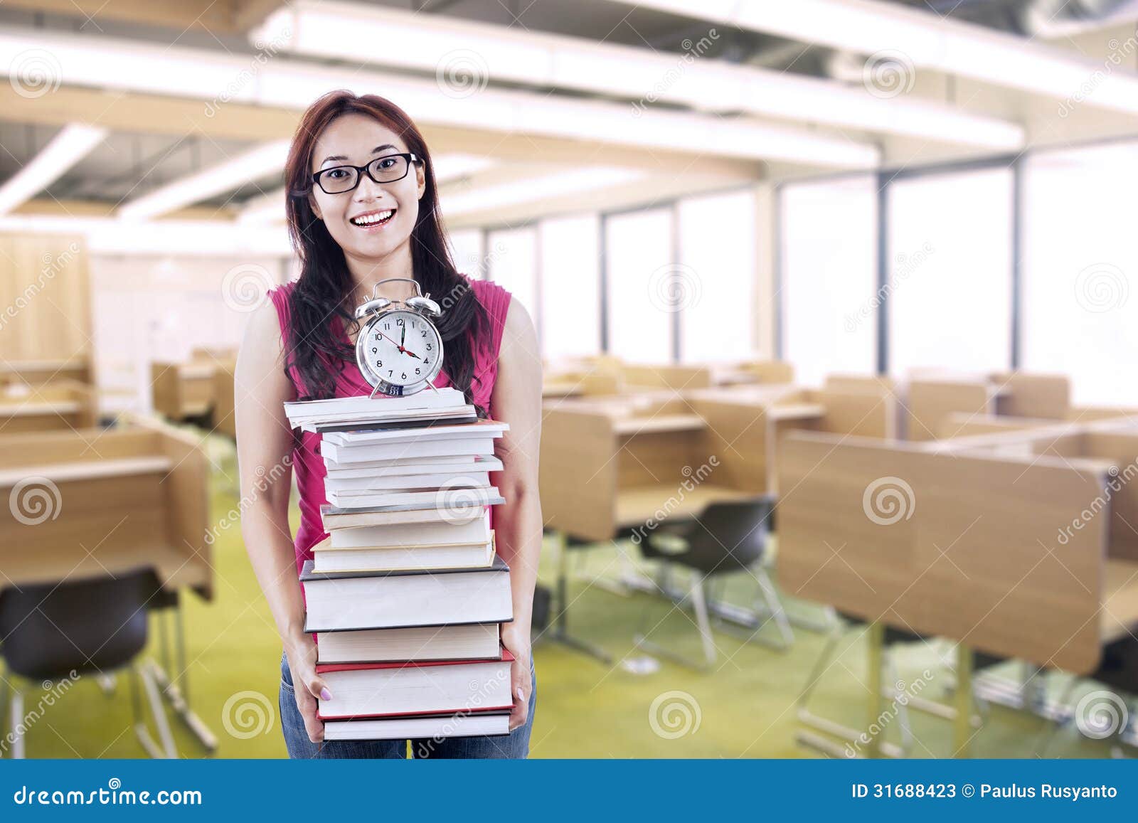 Happy Female Student Bring Stack of Books and Clock Stock Image - Image ...