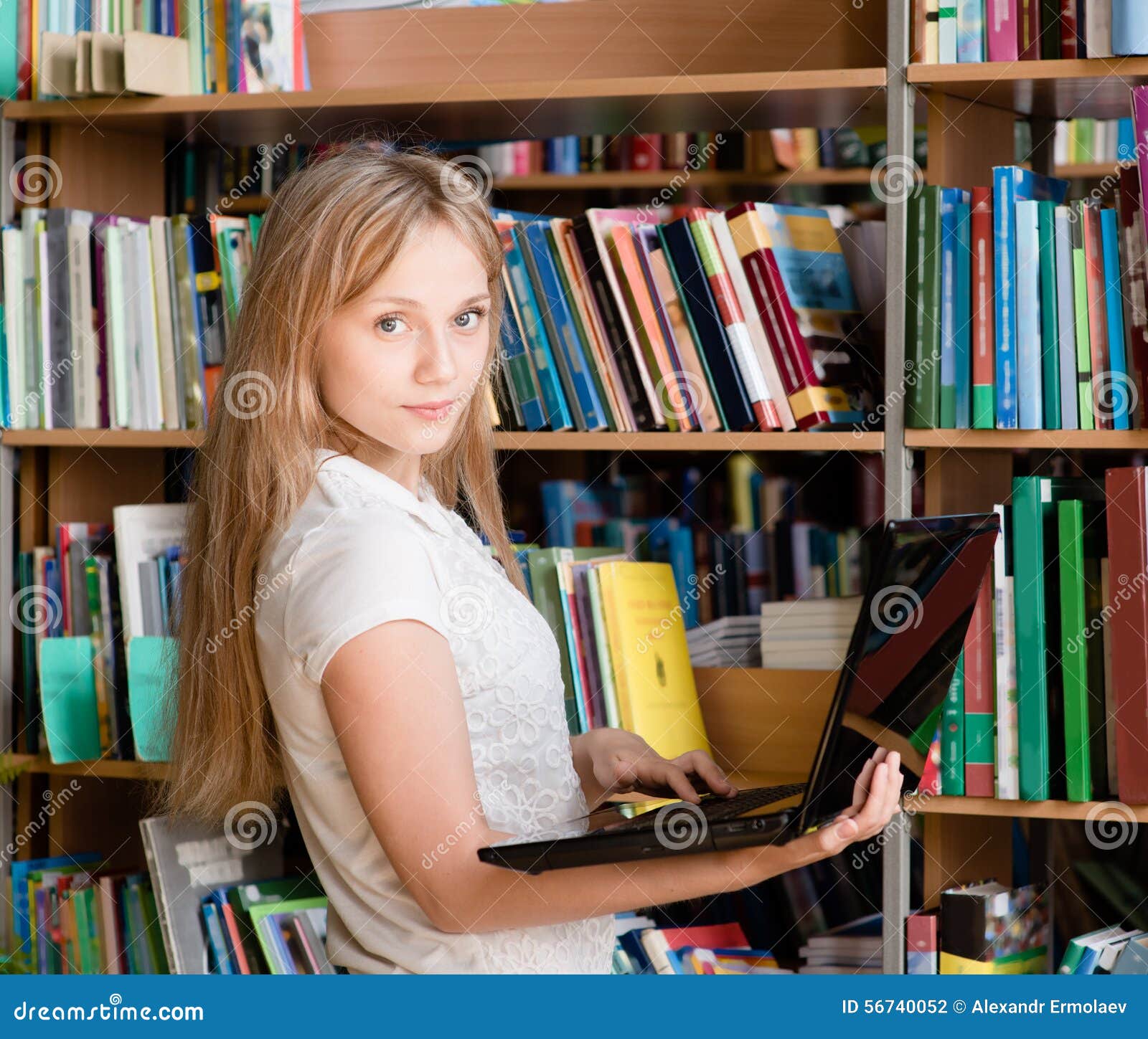 Happy Female Student with Laptop in Library Stock Photo - Image of ...
