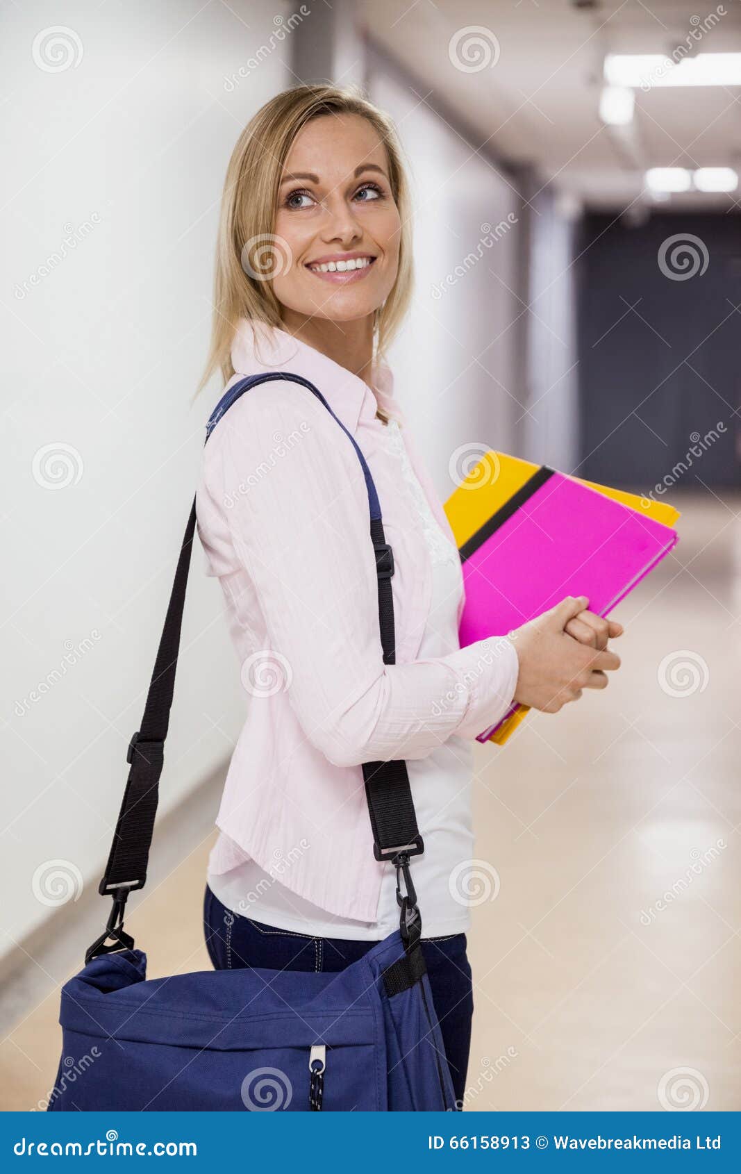 Happy Female Student Walking in the Hallway Stock Image - Image of ...