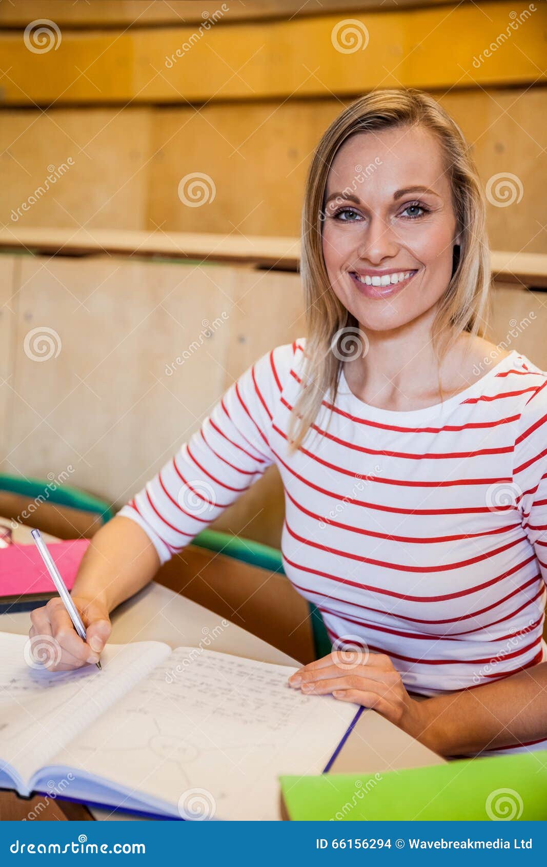 Happy Female Student Writing Notes Stock Photo - Image of college ...