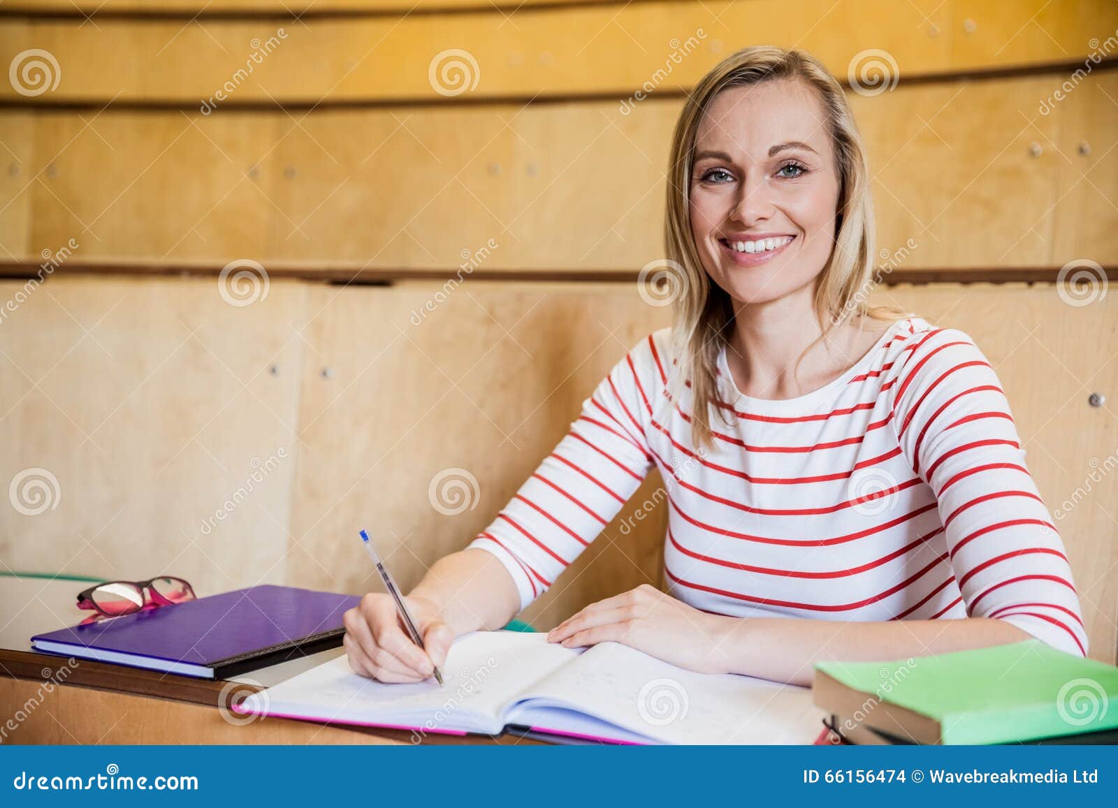 Happy Female Student Writing Notes Stock Photo - Image of learn, adult ...