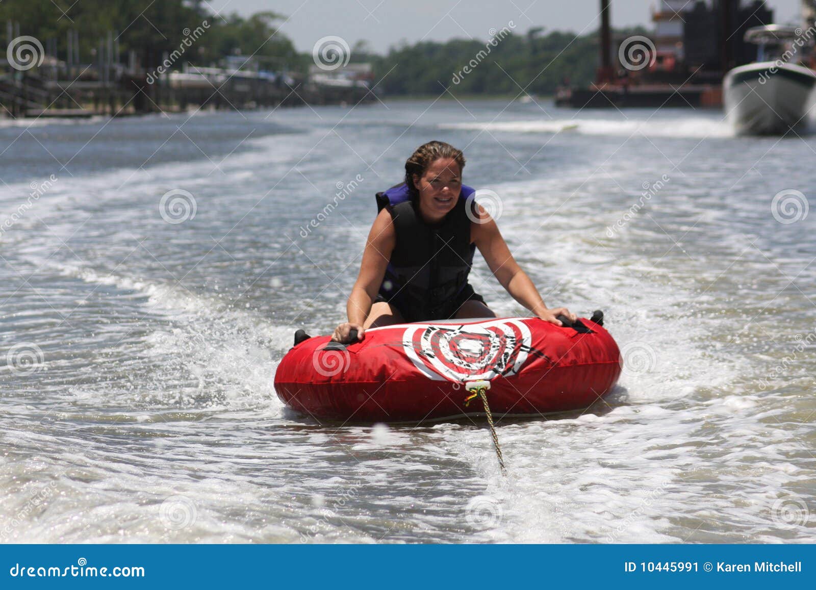 Happy Female tubing stock image. Image of sports, river - 10445991