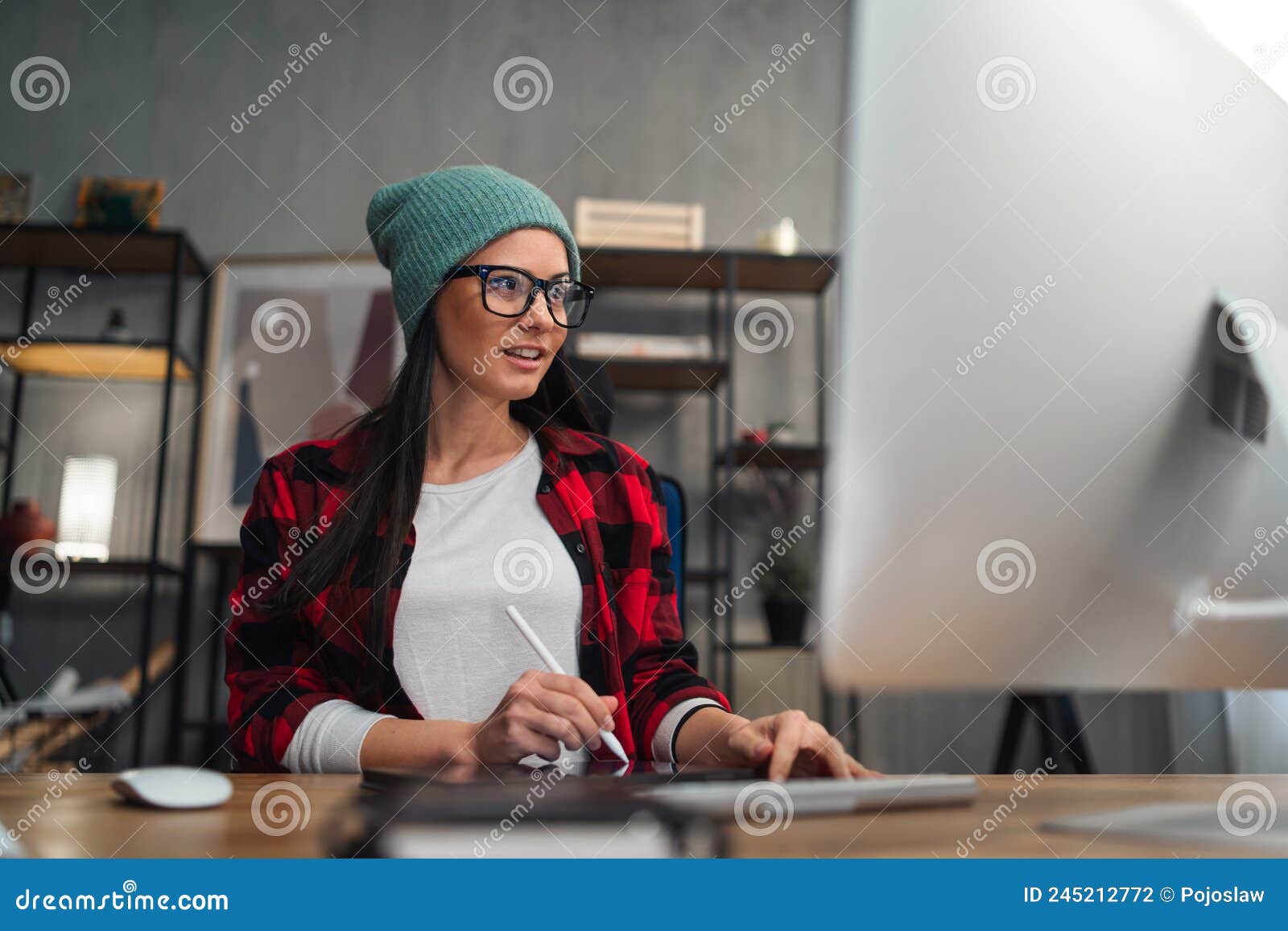 Happy Female Video Editor Works Indoors in Creative Office Studio Stock ...