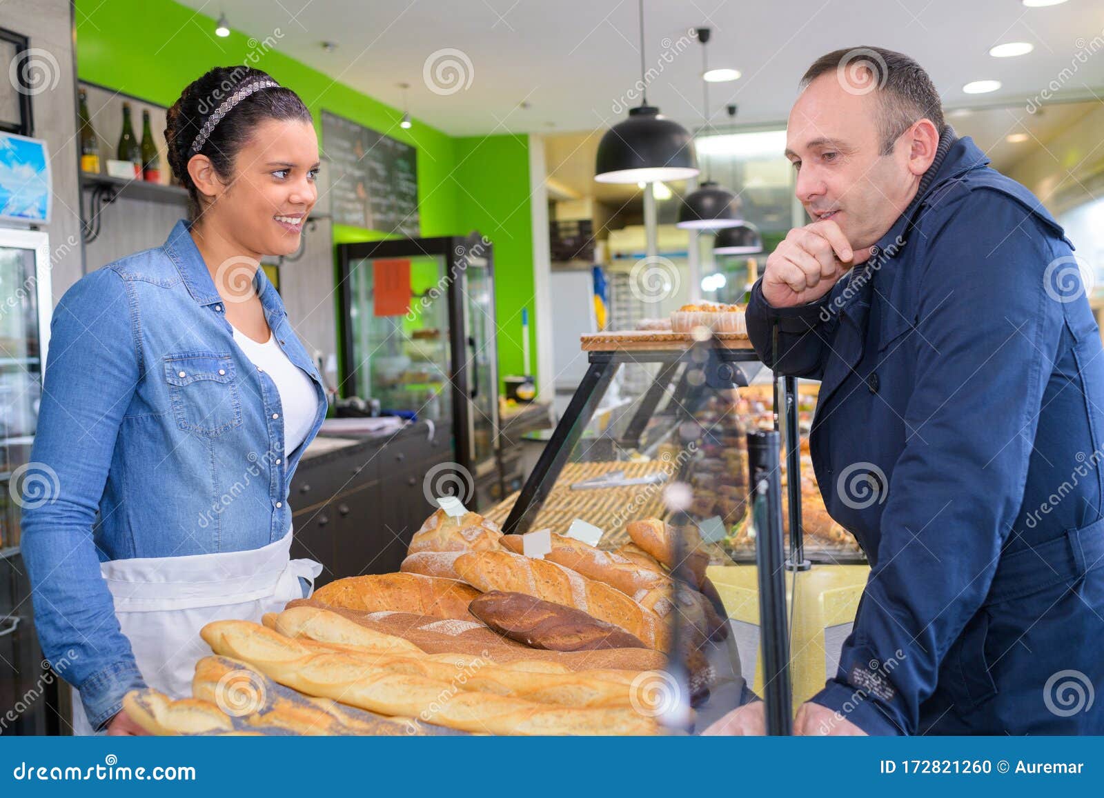 Happy Female Worker Selling Fresh Pastry Stock Photo - Image of pastry ...