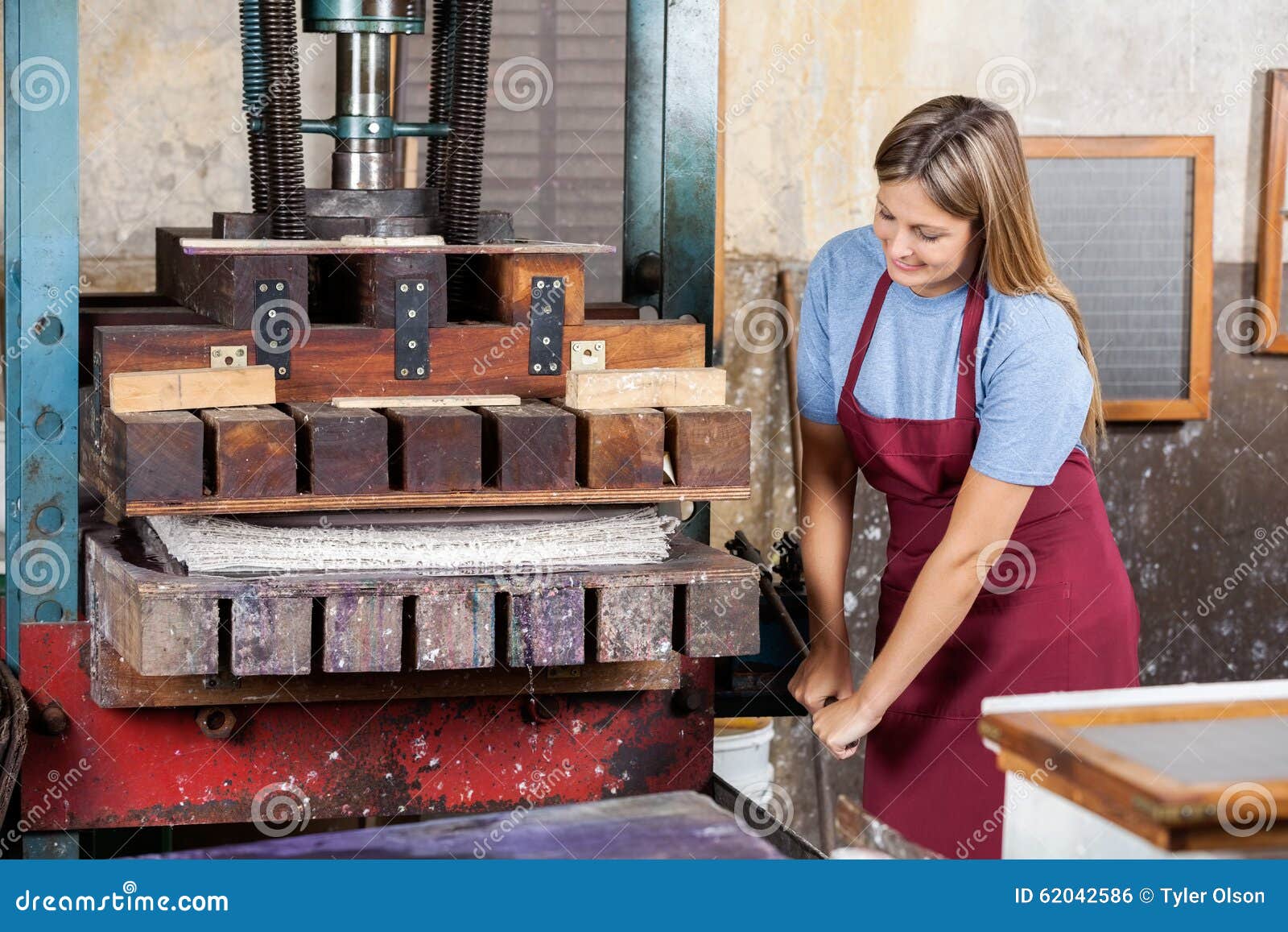Happy Female Worker Using Paper Press Machine Stock Photo - Image of ...
