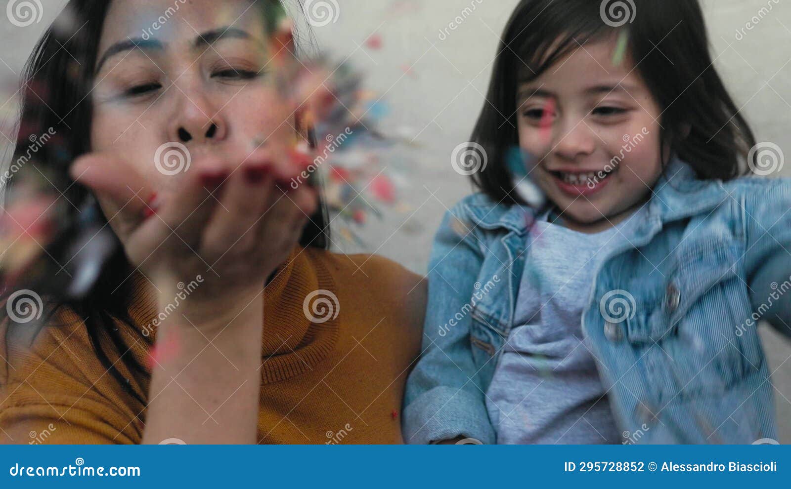 Happy Filipina Mother With Her Daughter Having Fun Playing Together