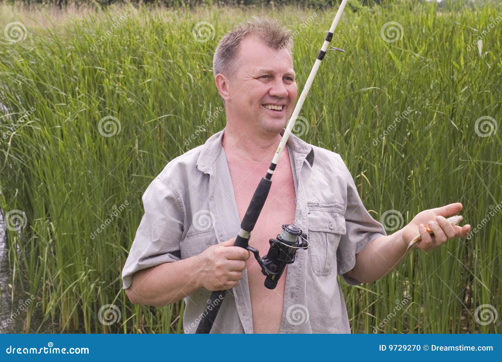 Happy fisherman stock photo. Image of lake, rushy, outdoors - 9729270