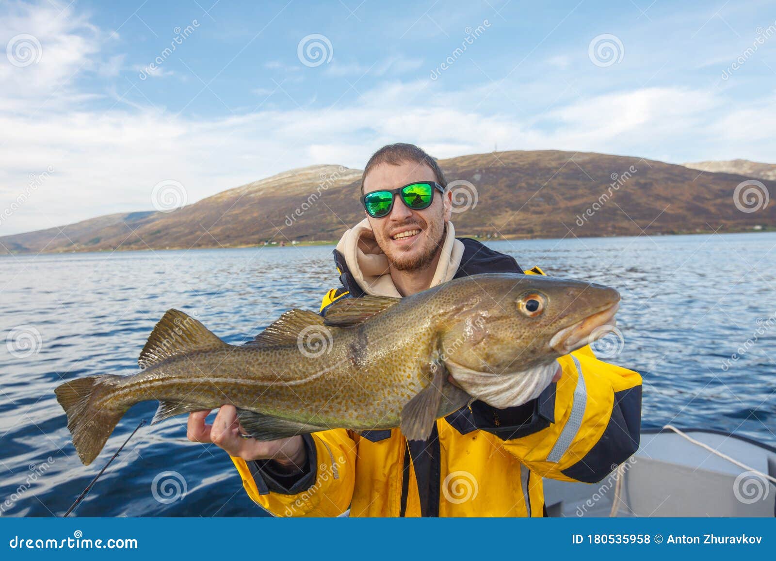 Happy Fisherman with Cod Fish in Hands Stock Photo - Image of boat ...