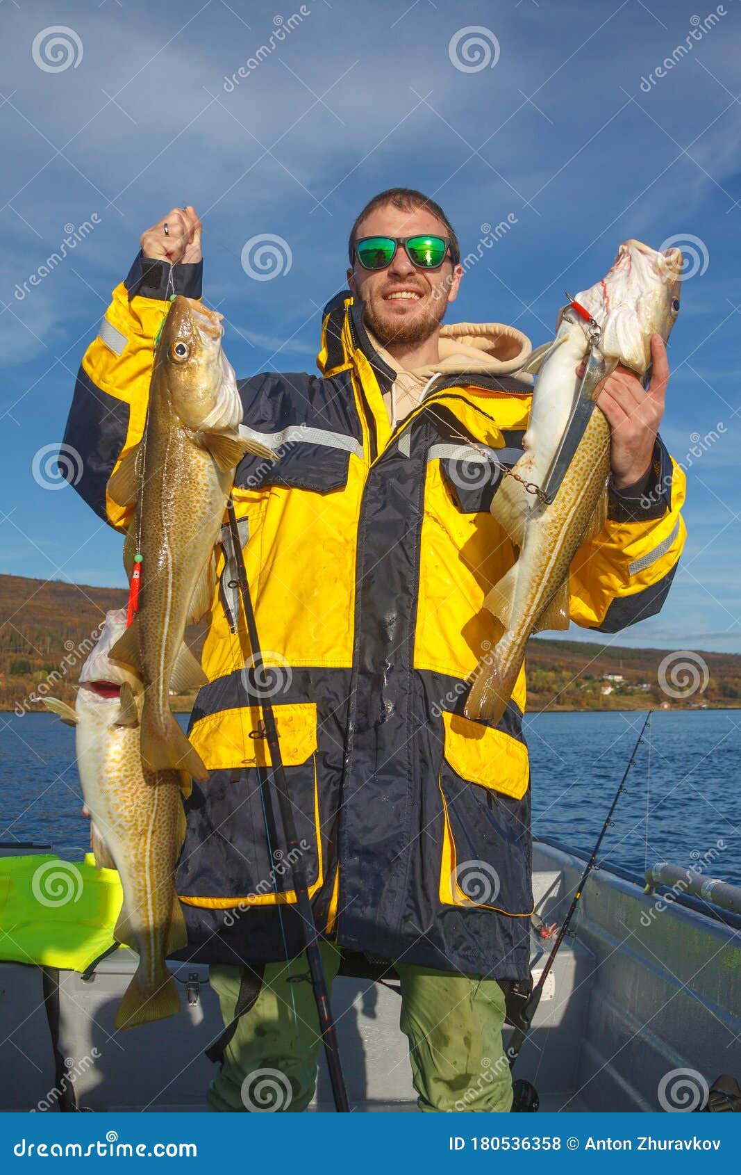 Happy Fisherman with Cod Fish in Hands Stock Photo - Image of boat ...