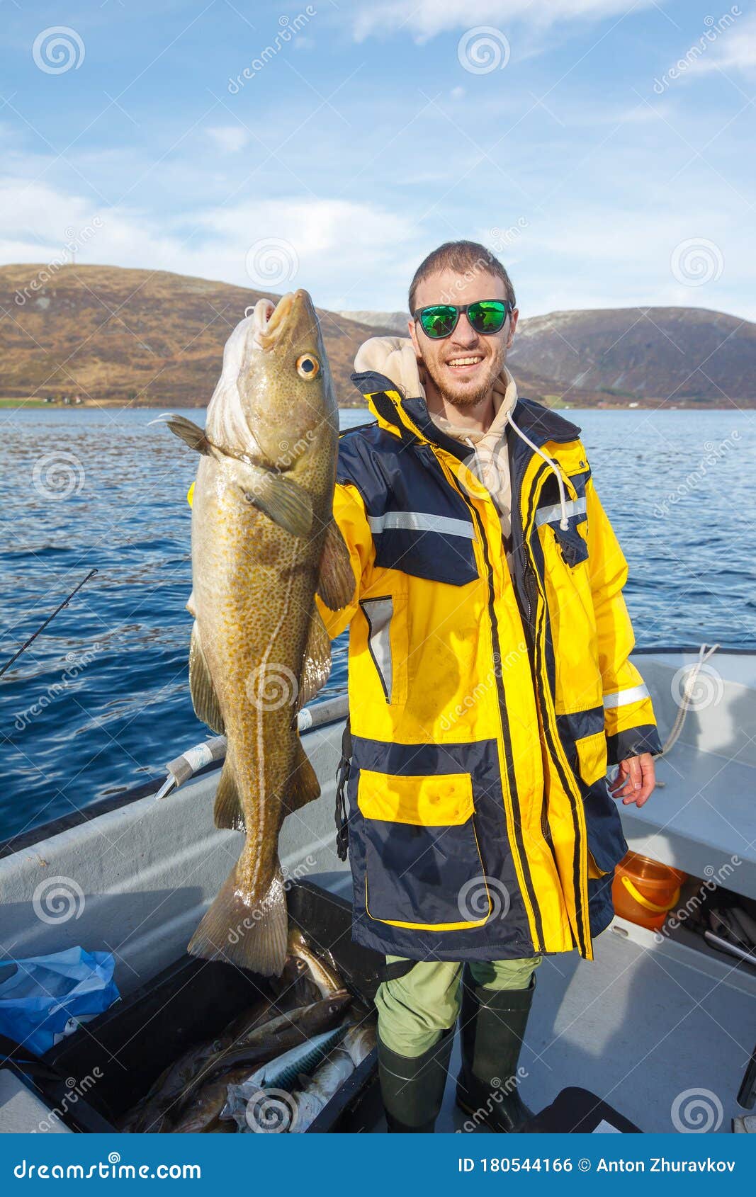 Happy Fisherman with Cod Fish in Hands Stock Photo - Image of hobby ...