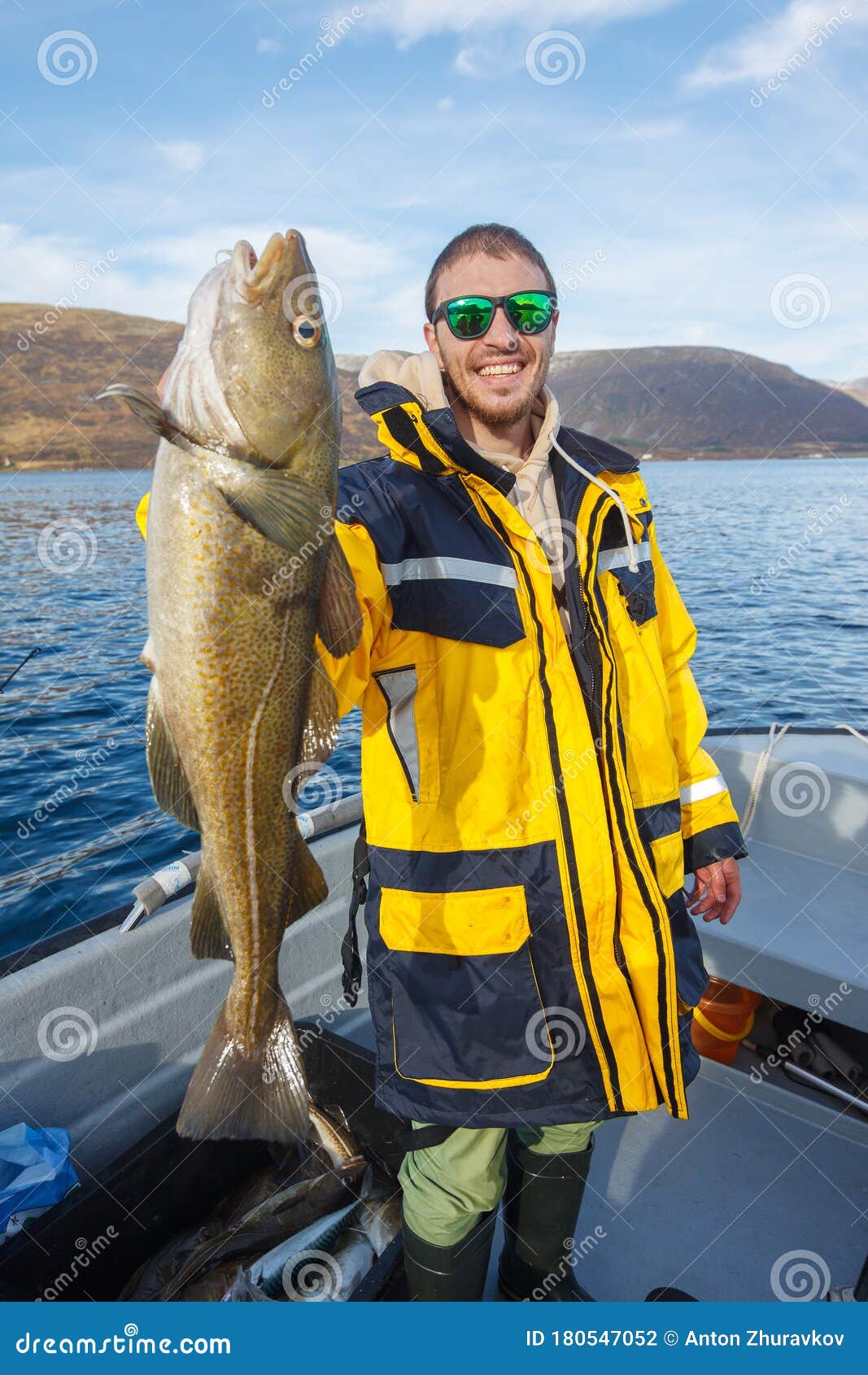 Happy Fisherman with Cod Fish in Hands Stock Photo - Image of caucasian ...