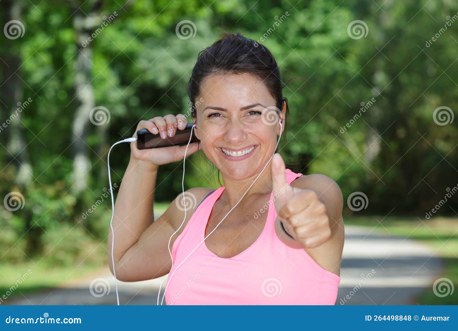 Happy Fit Woman Outdoors with Thumb Up Stock Photo - Image of activity ...