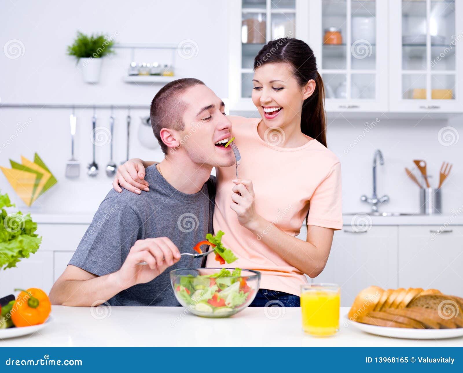 Happy Flirting Couple in the Kitchen Stock Image - Image of salad, male ...