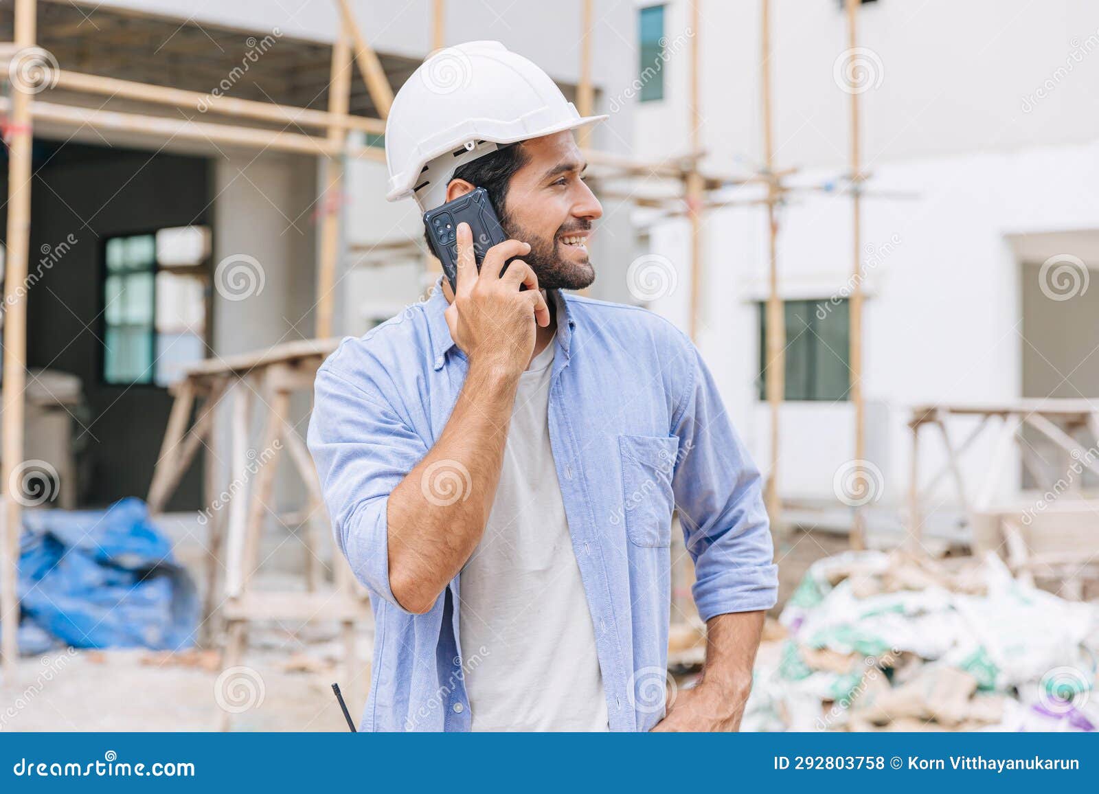 Happy Foreman Builder Using Smart Phone Calling Business Contact in ...