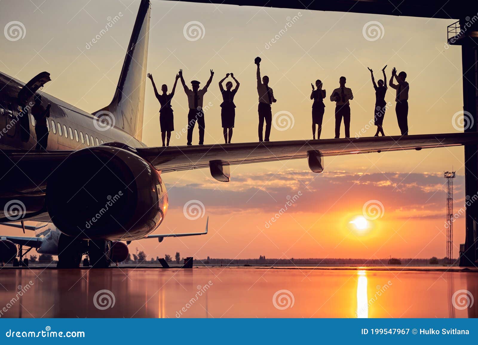 Happy Friendly Solid Team of Pilots and Stewardesses on Sunset ...