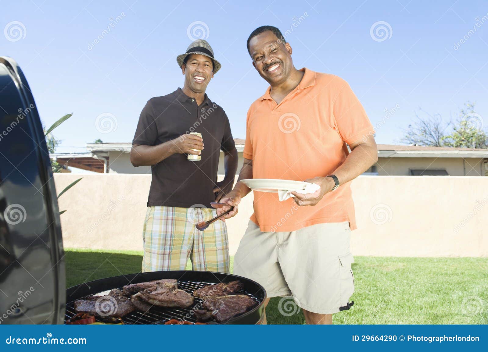 Happy Friends Barbecuing stock photo. Image of friend - 29664290