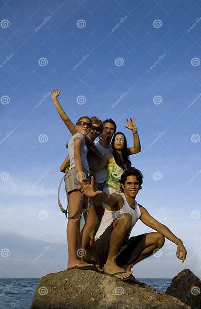 Happy friends on the beach stock image. Image of beautiful - 4262479